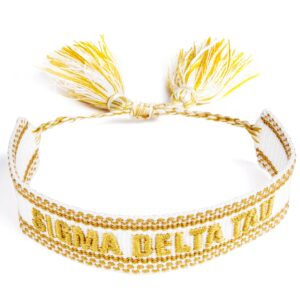 sorority shop sigma delta tau bracelet — woven bracelet, white and gold design with sdt sorority name and tassels, greek sorority jewelry and big little sorority gifts