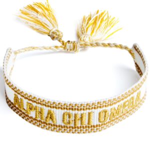 sorority shop alpha chi omega bracelet — woven bracelet, white and gold design with aco sorority name and tassels, greek sorority jewelry and big little sorority gifts