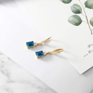 Gem Stone King 18K Yellow Gold Plated Silver London Blue Topaz and White Topaz Dangle Earrings For Women (6.08 Cttw, Gemstone November Birthstone, Emerald Cut 9X7MM)