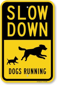 smartsign 18 x 12 inch “slow down - dogs running” metal sign with symbols, 63 mil laminated rustproof aluminum, black and yellow, made in usa