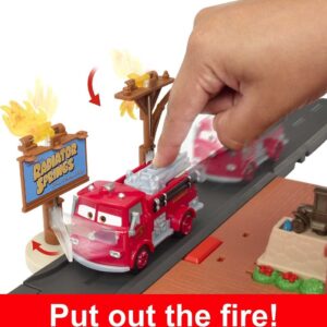 Mattel Disney and Pixar Cars On The Road Toys, Red’s Fire Station Playset with Die-cast Fire Truck & Kid-Activated Action