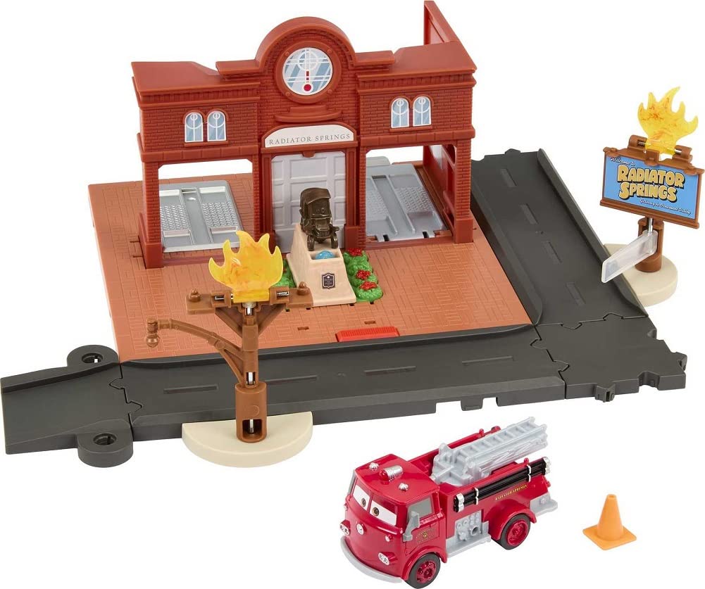 Mattel Disney and Pixar Cars On The Road Toys, Red’s Fire Station Playset with Die-cast Fire Truck & Kid-Activated Action