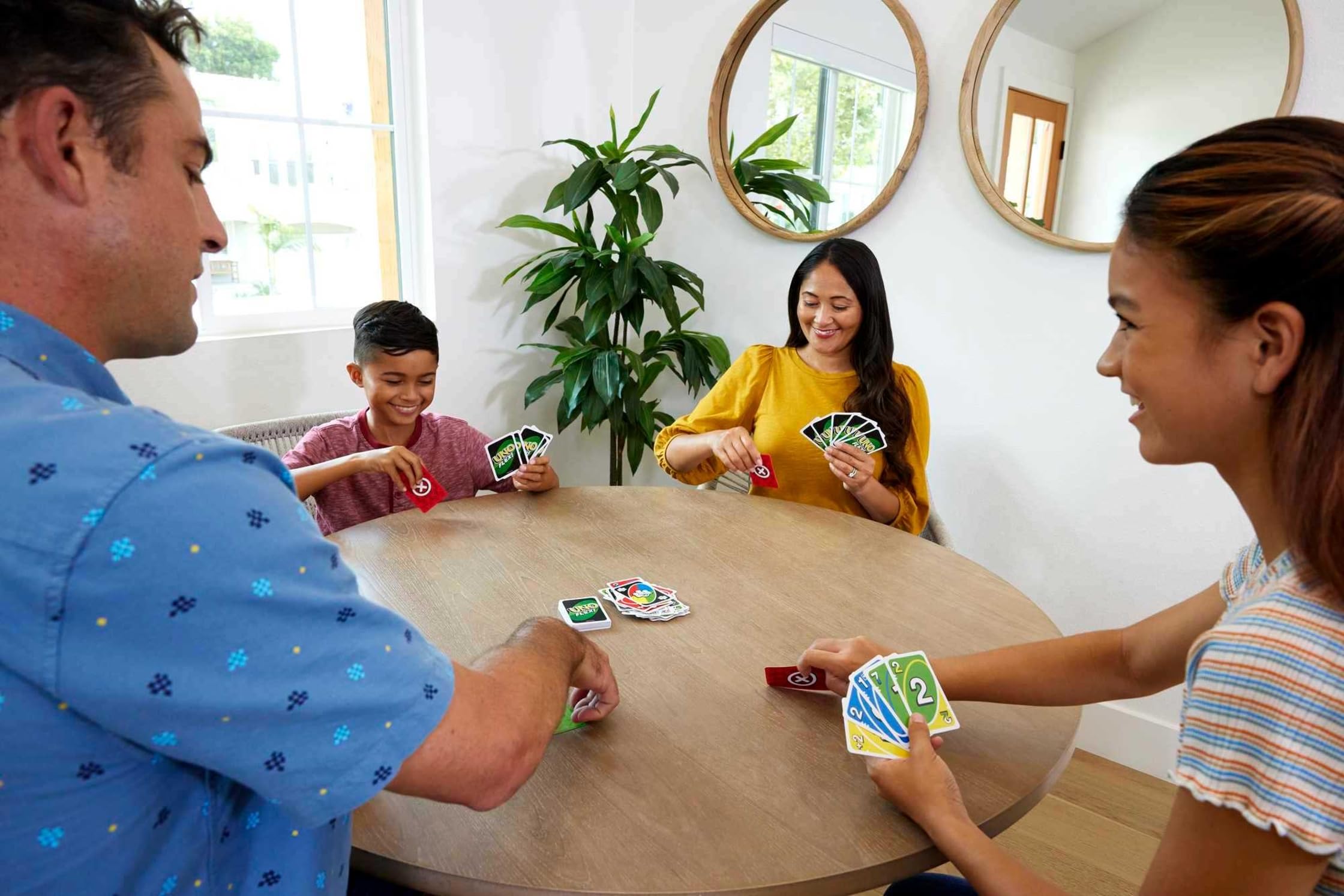 Mattel Games UNO Flex Card Game for Family Night Where Cards Change Color When Flexed in Collectible Tin Box