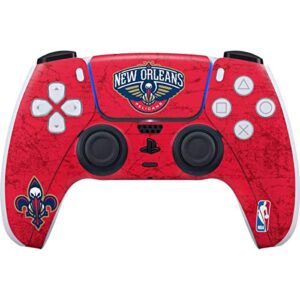 skinit decal gaming skin compatible with ps5 controller - officially licensed nba new orleans pelicans distressed design