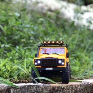 HobbyToki 1/12 RC Crawler 4WD 2.4G Rock Truck Buggy Offroad Cars Defender with Roof Light Sound Full Scale Remote Control Adult Kids Toys (Yellow)