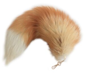 golden luxe: genuine silver fox tail keychain pendant in rich gold with white tip – a fashionable and versatile accessory