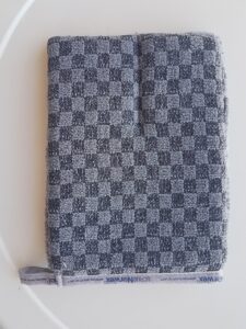 norwex graphite (gray) bathroom scrub mitt.