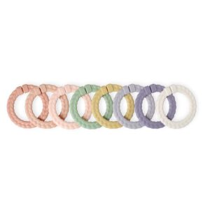 itzy ritzy linking ring set; set of 8 braided, rainbow-colored versatile linking rings; attach to baby's car seat, stroller & activity gym to keep toys nearby; pink rainbow