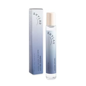 skylar indigo valley eau de parfum - hypoallergenic & clean perfume for women & men, vegan & safe for sensitive skin- woody, floral perfume, blueberry mocha, water lotus & clearwood - 10ml /0.33 fl oz