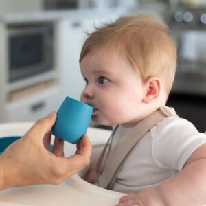 ezpz Tiny Cup 3-Pack (Blue, Coral & Gray) - 100% Silicone Training Cup for Infants - Designed by a Pediatric Feeding Specialist - 4 months+ - Baby-led Weaning Gear & Baby Gift