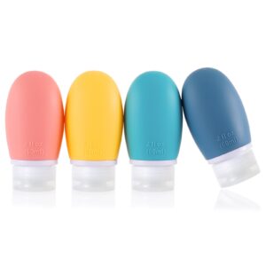 leak proof silicone travel bottles,4 pack 2oz liquid squeezable refillable portable travel accessories/cosmetic containers,bpa free,travel size bottles for toiletries shampoo conditioner lotion