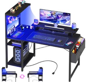 homieasy gaming desk with power outlets & pegboard & led light, 43 inch computer desk with reversible storage shelves & side storage bag, pc gamer desk with hutch & monitor stand, carbon fiber black