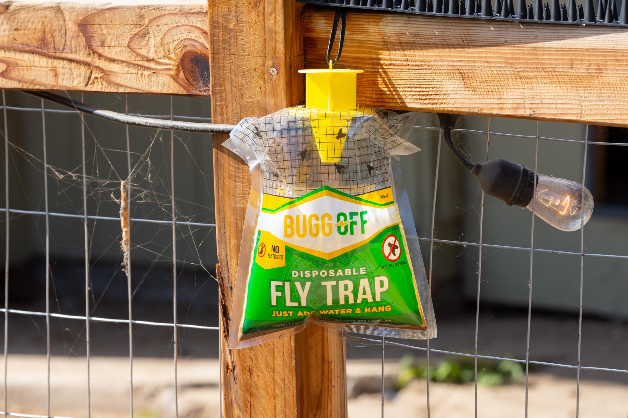 Bugg Off - 4 Pack Outdoor Disposabe Hanging Fly Traps with Natural Pre-Bait, Catches Flyes Everywhere Anywhere, Stables, Ranches, Cottages and More. Cut, Fill, and Hang!