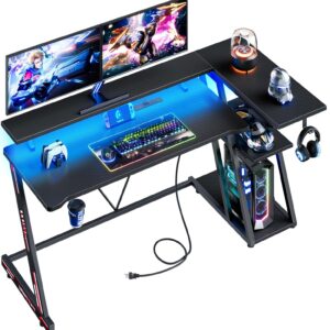 Korfile Reversible Gaming Desk with Power Outlet & LED Lights, Corner Computer Desk with 3 Tiers Storage Shelves, Home Office Desk with Monitor Stand for Small Space, 47 Inch Carbon Fiber Black