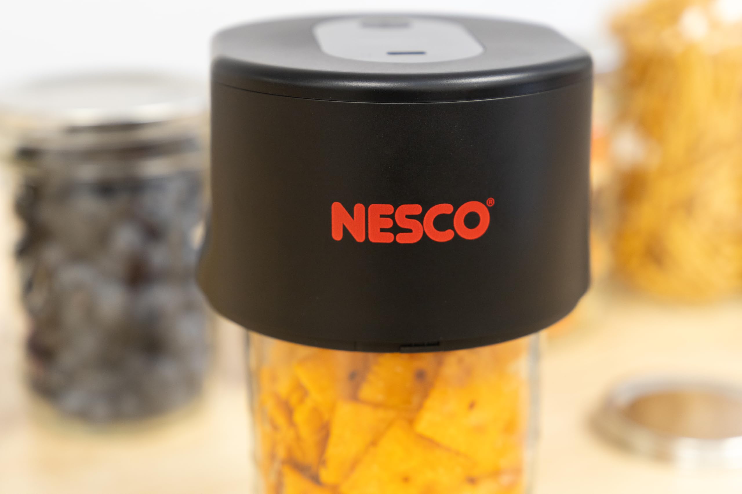 Nesco Electric Mason Jar Vacuum Sealer Kit, Type-C charging, fits wide and regular mouth jars, comes with 5 regular and 5 wide lids, bottle opener, and charging cable