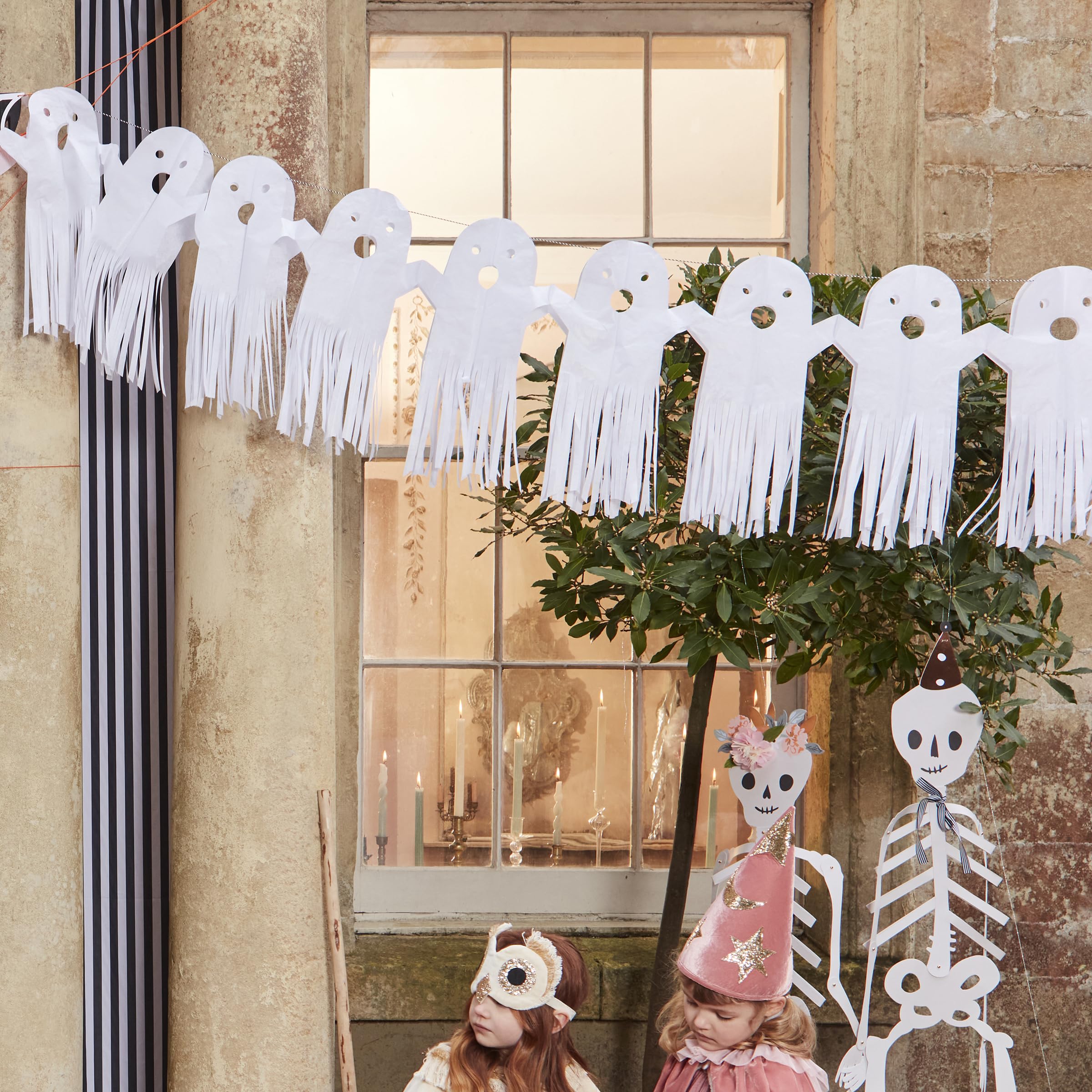 Meri Meri Large Tissue Paper Ghosts Halloween Garland (Pack of 1), 6.5’ Strand with Excess Cord, Features 10 White Ghosts with Cut Out Fringed Details, Large Reusable Halloween Party Decoration