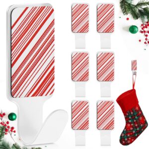 morningro 16 pcs christmas adhesive stocking hanger set 8 white metallic hooks with 8 red and white magnetic patches damage free wall adhesive hooks for hanging christmas decorations