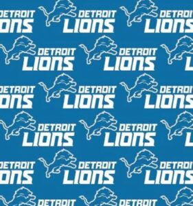 fabric traditions lions blue/white football team 100% cotton sold by the yard