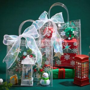 Henoyso 24 Pcs Snowflake Clear Gift Bags Winter Frozen Party Favors Bags Christmas Plastic Candy Goodie Treat Bags with Handles and Ribbon 7.8 x 7.8 x 3.1 PVC Gift Wrap Tote(Laser Silver)