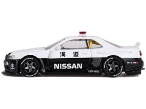 skyline gt-r (r34) kaido works (v2 aero) rhd (right hand drive) black and white japan police (designed by jun imai) kaido house special 1/64 diecast model car by mini gt khmg120