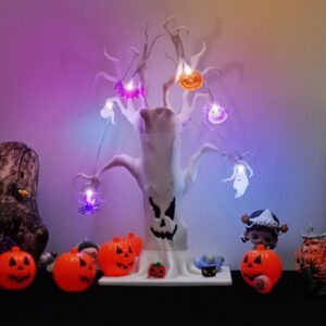 halloween tree decorative centerpiece with spooky ornaments, halloween lights with skulls, ghosts, bats, pumpkins, and spiders at the top of the tree, suitable for rooms, tables, and mantelpiece.