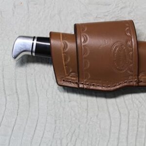 CARL THOMAS LEATHERS Crossdraw knife sheath. quality leather quality stitching. fix blade Nylon stitching. may defeat a 103. Knife holder.