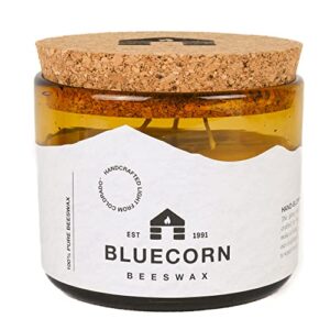 bluecorn beeswax candle in artisan blown glass. 100% pure, unscented raw beeswax candle in 100% recycled glass. non-toxic. handmade in colorado. 3-wick candle in 22 oz amber glass.