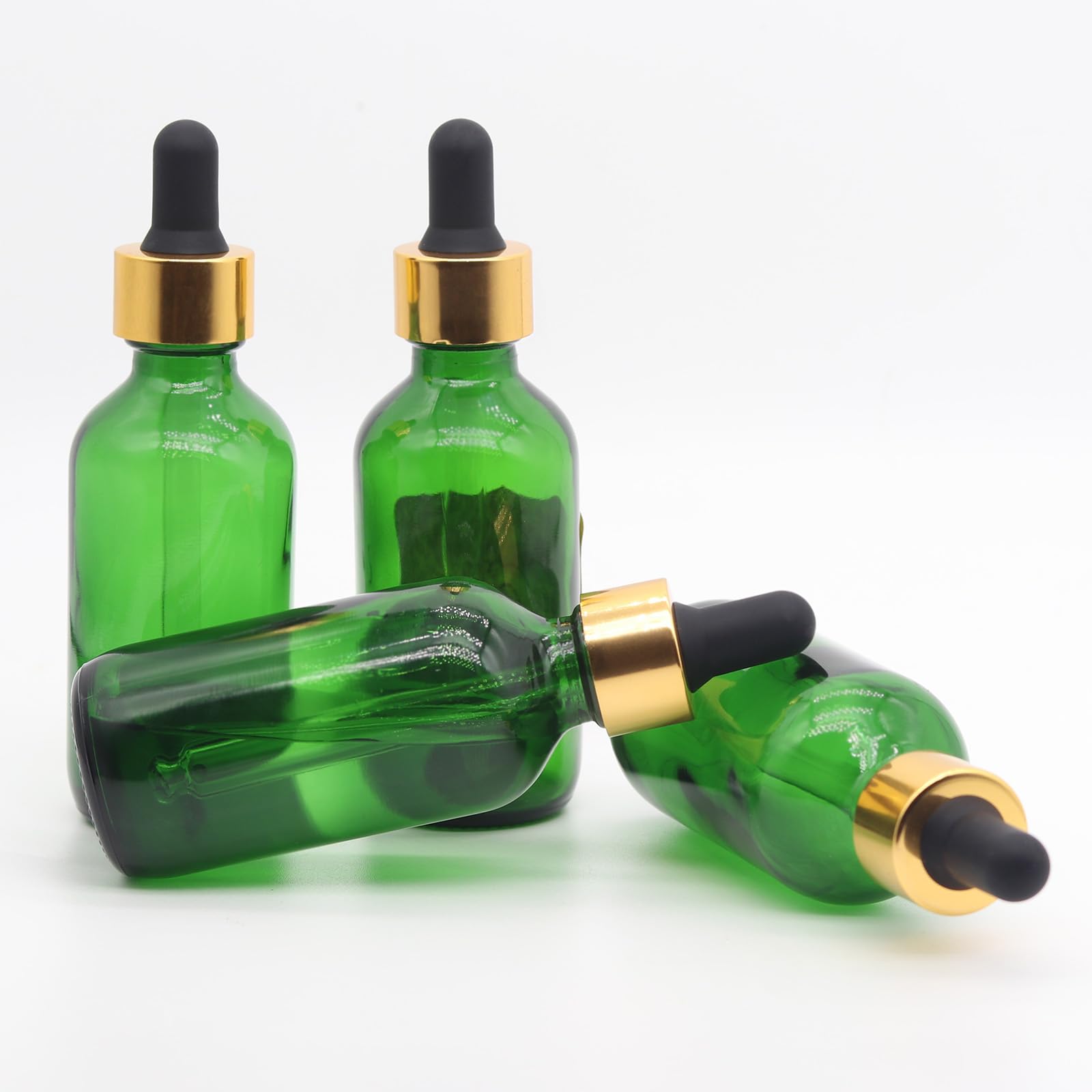 Toaazhy 4 pack,green glass dropper bottles 2 oz,60 ml dark empty tincture bottles with dropper,alcohol,hair oil bottle,eye,small,droppers for oils,medicine,pipette,drip drop,travel,perfume,essentia