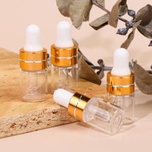 Comrzor 50 Pack 2ml Clear Glass Dropper Bottles with 2 Pcs Plastic Droppers, Mini Sample Dropper Bottles for Essential Oils Perfume Cosmetic Liquid, Empty Travel Sample Vials with Gold Cap