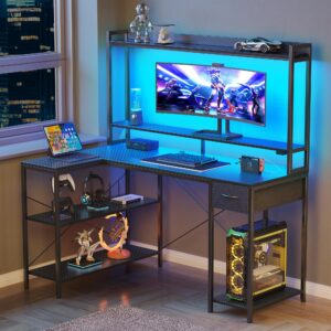 Seventable Gaming Desk with LED Light & Power Outlets, 47 inch Computer Desk with Shelves, Reversible L Shaped Desk with Monitor Stand, Corner Desk for Small Space, Carbon Fiber Black