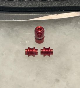 translucent red thumb stud and standoffs for benchmade 535 bugout knife