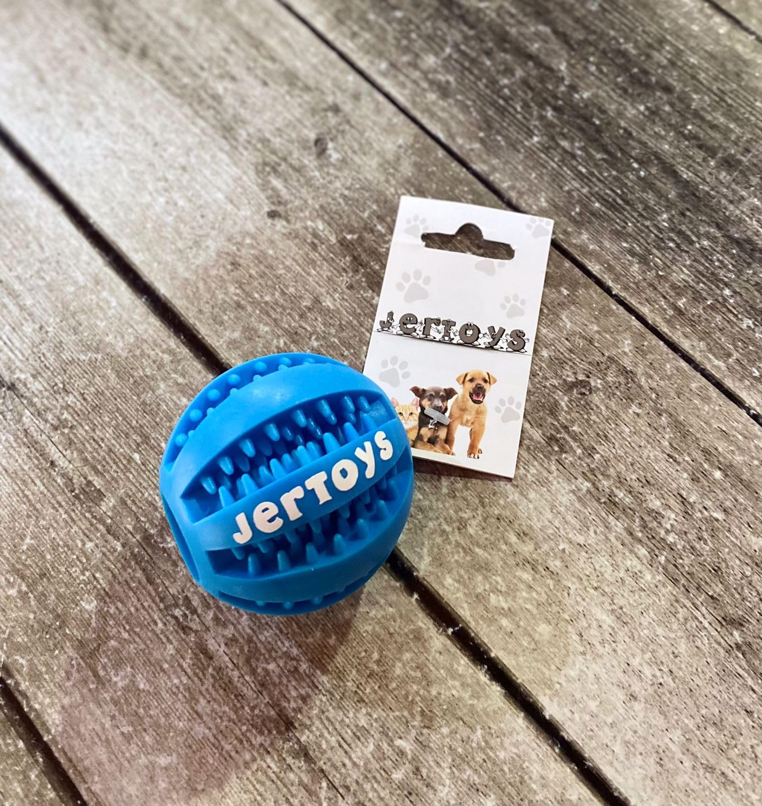 Jertoys Juguetes, Pelota para Perros Indestructible. Bola masticable resistente a las mordeduras con comedero en sus ranuras Ideal para la limpieza de dientes y entretemiento de sus mascotas (Blue)