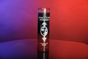 reversible double action (black over red) pillar candle candela santeria orisha