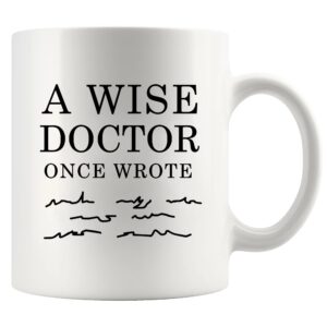 panvola a wise doctor once wrote funny doctor gifts dr mom dad husband wife boyfriend girlfriend graduation gifts for new physician surgeon medical student md practitioner ceramic mug (11 oz, white)