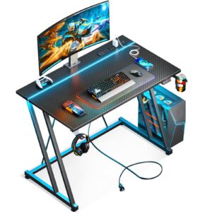 motpk small gaming desk with led lights & power outlet, computer desk 31.5inch for small space, cheap gaming table with carbon fiber texture, kids desk gift for boys men, black