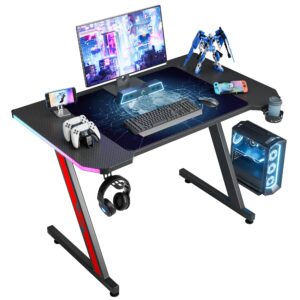 homall gaming computer desk with carbon fiber surface, gaming table z shaped pc home office with cup holder&headphone hook(47 in, black, led light)