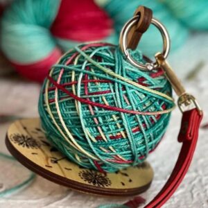 Portable Wrist Yarn Holder Wrist Pendant Yarn Ball Holder Mini Minder Prevents Yarn Tangling and Misalignment Ultimate Companion for Every Knitting and Crochet Enthusiast (Red)