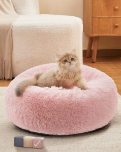 ohgeni calming donut dog & cat bed, machine washable plush warming bed, anti-slip round cuddle comfort pet bed, cozy fluffy faux fur bed for small dogs, pink, 20 inches