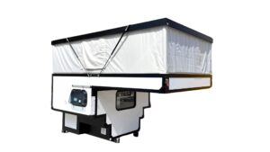 pop-up truck camper with sliding queen size bed/sofa bed/bathroom and kitchen., white