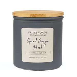 crossroads spiced georgia peach colored glass candle, 14 oz