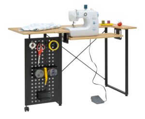 pivot sewing table with swingout storage panel