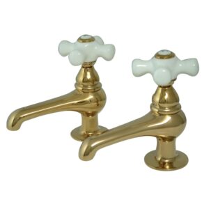 widespread bathroom faucet with porcelain cross handle finish: polished brass