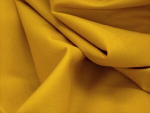 vogue fabrics broadcloth- poly/cotton gold