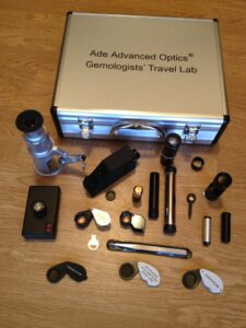 gemologists' travel/portable lab suitcase. including microscope, dichroscope, spectroscope, chelsea filter, ruby filter, jadeite filter, polariscope, darkfield loupe, uv magnifier, gem refractometer, polariscope, conoscope, refractive index liquid oil, ge