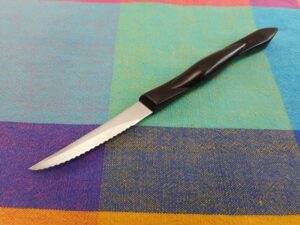 cutco model 1798 mini trimmer knife .............high carbon stainless 3.5" double-d serrated edge blade with 5" classic dark brown handle (often called "black")........in factory-sealed plastic bag.