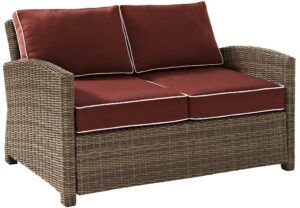 crosley furniture bradenton wicker outdoor loveseat, 2-person patio couch for porch, deck, backyard, brown with sangria cushions