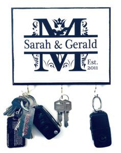 personalized key holder for wall - custom key hanger with family or couple's name | vinyl or laser engraved options | natural wood key rack | made in usa.