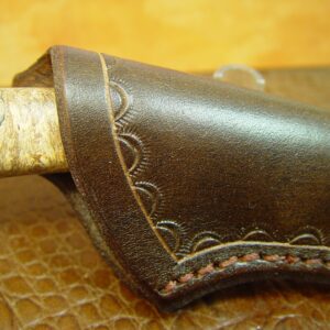 Custom Leather Vertical Knife Sheath. The Sheath Is Made Out of 10 Ounce Water Buffalo Hide Leather with a Border Tooling Dyed Dark Brown. The Sheath Is Made Out of Water Buffalo Leather the Water Buffalo Leather Is Very Soft Pliable and Durable. The Shea