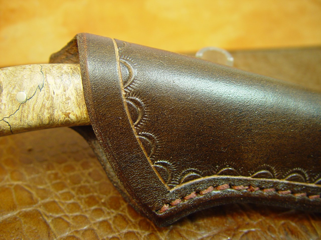 Custom Leather Vertical Knife Sheath. The Sheath Is Made Out of 10 Ounce Water Buffalo Hide Leather with a Border Tooling Dyed Dark Brown. The Sheath Is Made Out of Water Buffalo Leather the Water Buffalo Leather Is Very Soft Pliable and Durable. The Shea