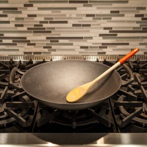 It's useful. 14 Inch Cast Iron Wok with Handles and Built in Base